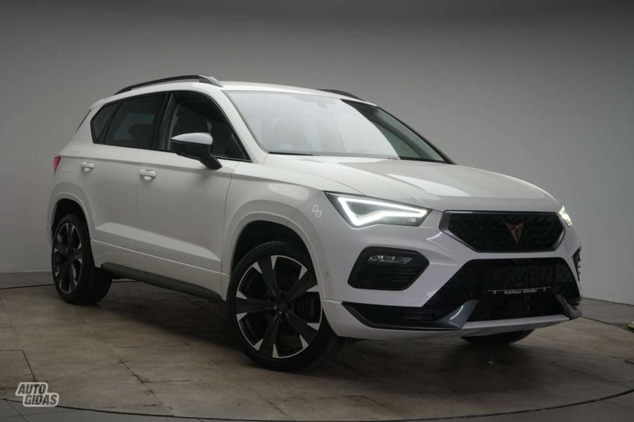 White Cupra ateca 2023 in Kaunas, with an engine capacity of 1.50 L and mileage of 58 thousand km for 31114 €, photo 1 on AUTOMOTO.COM.LV