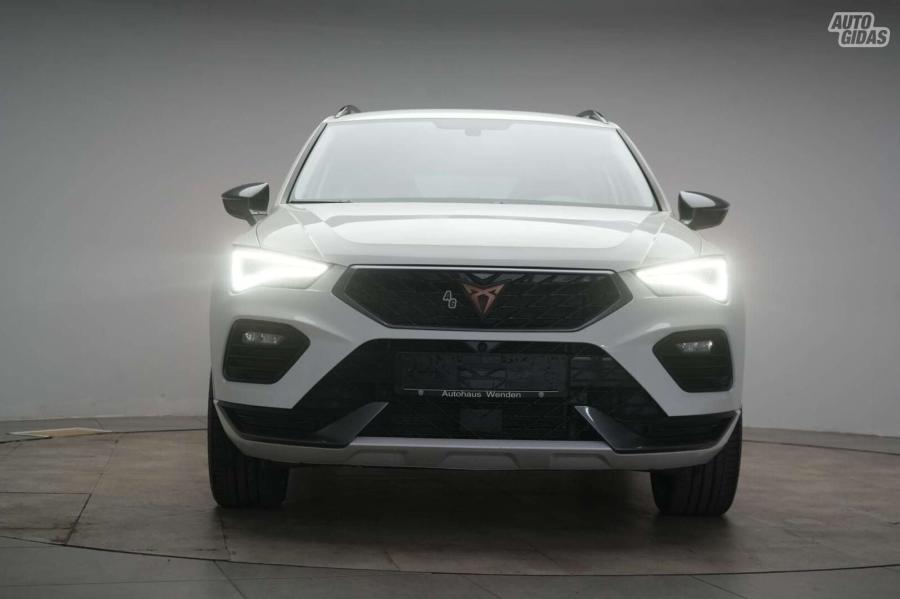 White Cupra ateca 2023 in Kaunas, with an engine capacity of 1.50 L and mileage of 58 thousand km for 31114 €, photo 2 on AUTOMOTO.COM.LV