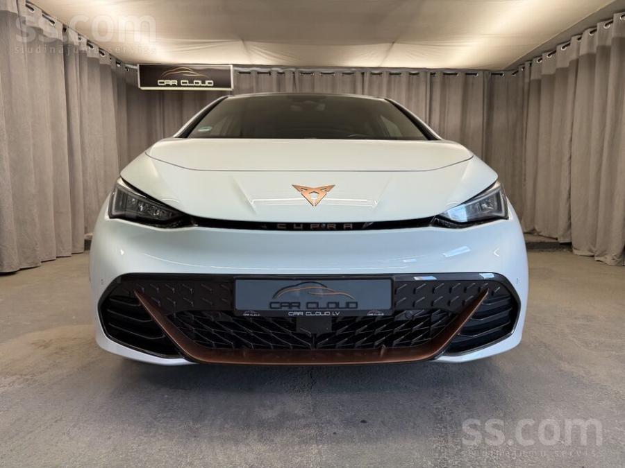 White Cupra Born 2023 in Riga, with an engine capacity of 0.00 L and mileage of 99 thousand km for 22990 €, photo 3 on AUTOMOTO.COM.LV