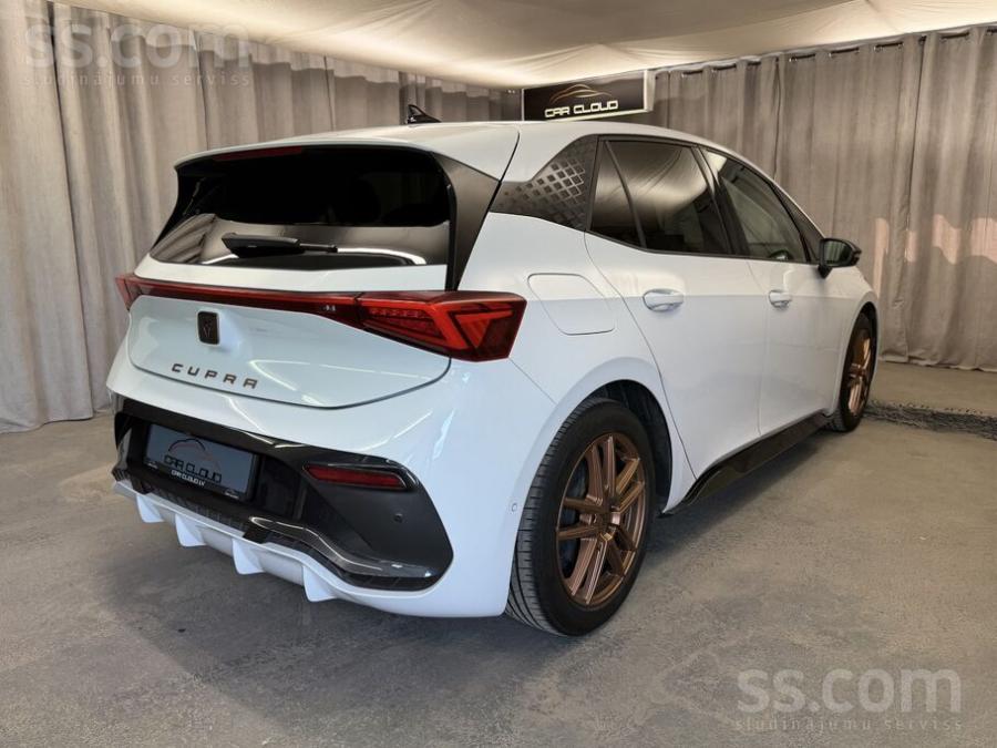 White Cupra Born 2023 in Riga, with an engine capacity of 0.00 L and mileage of 99 thousand km for 22990 €, photo 5 on AUTOMOTO.COM.LV
