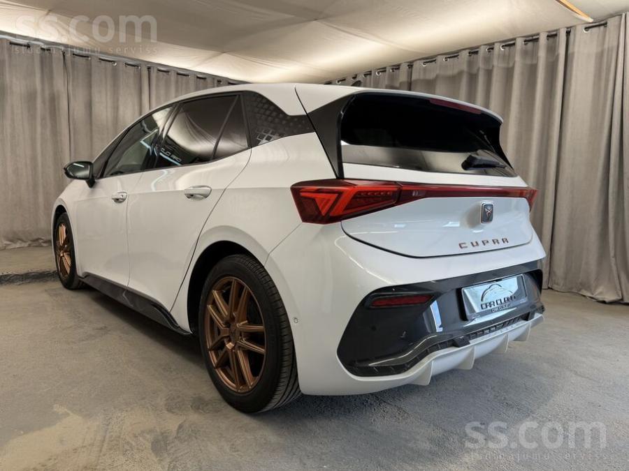White Cupra Born 2023 in Riga, with an engine capacity of 0.00 L and mileage of 99 thousand km for 22990 €, photo 7 on AUTOMOTO.COM.LV
