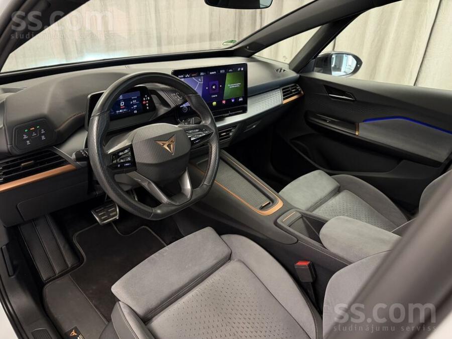 White Cupra Born 2023 in Riga, with an engine capacity of 0.00 L and mileage of 99 thousand km for 22990 €, photo 8 on AUTOMOTO.COM.LV