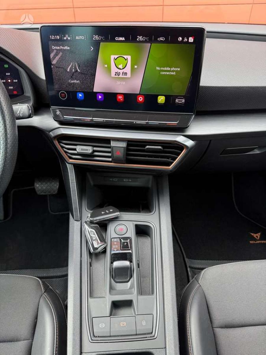 White Cupra Leon 2024 in Utena, with an engine capacity of 1.97 L and mileage of 61 thousand km for 18600 €, photo 16 on AUTOMOTO.COM.LV