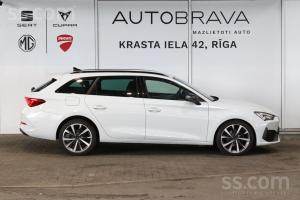 White Cupra Leon 2024 in Riga, with an engine capacity of 1.50 L and mileage of 50 thousand km for 23990 €, photo 6 on AUTOMOTO.COM.LV