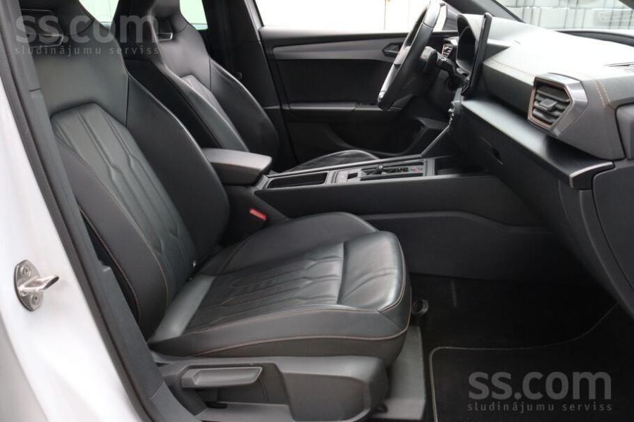 White Cupra Leon 2024 in Riga, with an engine capacity of 1.50 L and mileage of 50 thousand km for 23990 €, photo 32 on AUTOMOTO.COM.LV
