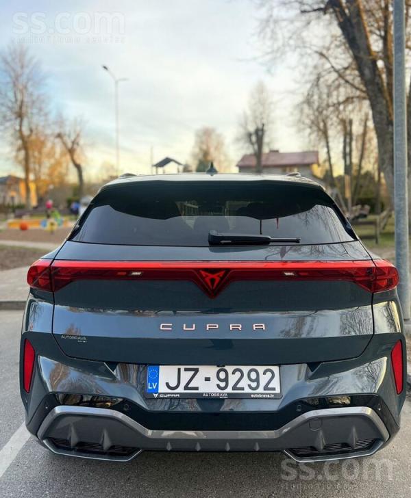 Blue Cupra Terramar 2025 in Riga, with an engine capacity of 2.00 L and mileage of 18 thousand km for 38300 €, photo 4 on AUTOMOTO.COM.LV