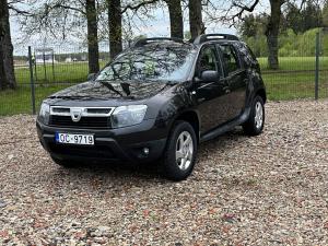 Black Dacia Duster 2011 in Cesis, with an engine capacity of 1.50 L and mileage of 0 thousand km for 6950 €, photo 5 on AUTOMOTO.COM.LV