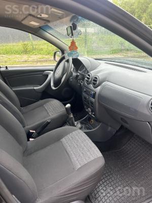 Black Dacia Duster 2011 in Daugavpils, with an engine capacity of 1.50 L and mileage of 212 thousand km for 3850 €, photo 12 on AUTOMOTO.COM.LV