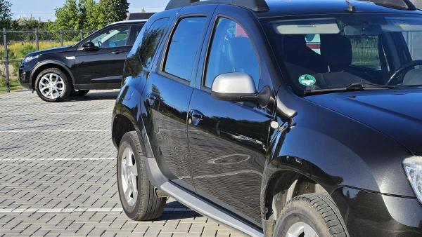 Black Dacia Duster 2011 in Taurage, with an engine capacity of 1.46 L and mileage of 214 thousand km for 3900 €, photo 4 on AUTOMOTO.COM.LV
