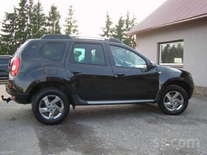 Black Dacia Duster 2012 in Riga, with an engine capacity of 1.60 L and mileage of 0 thousand km for 7250 €, photo 3 on AUTOMOTO.COM.LV