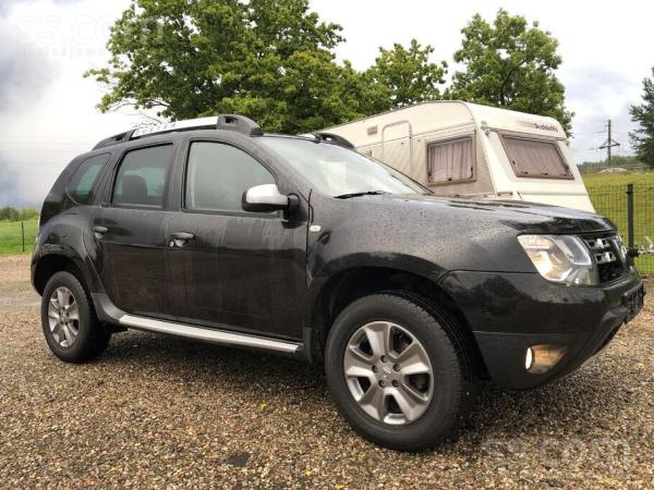 Black Dacia Duster 2014 in Valmiera, with an engine capacity of 1.20 L and mileage of 101 thousand km for 6790 €, photo 2 on AUTOMOTO.COM.LV
