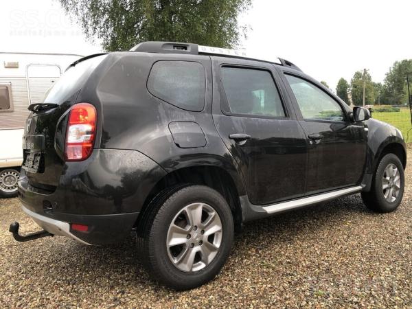 Black Dacia Duster 2014 in Valmiera, with an engine capacity of 1.20 L and mileage of 101 thousand km for 6790 €, photo 3 on AUTOMOTO.COM.LV
