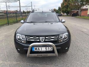 Black Dacia Duster 2015 in Siauliai, with an engine capacity of 1.20 L and mileage of 99 thousand km for 6200 €, photo 2 on AUTOMOTO.COM.LV
