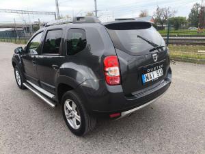 Black Dacia Duster 2015 in Siauliai, with an engine capacity of 1.20 L and mileage of 99 thousand km for 6200 €, photo 6 on AUTOMOTO.COM.LV