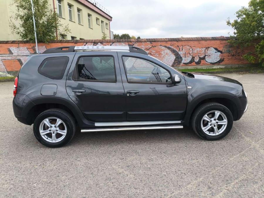 Black Dacia Duster 2015 in Siauliai, with an engine capacity of 1.20 L and mileage of 99 thousand km for 6200 €, photo 7 on AUTOMOTO.COM.LV