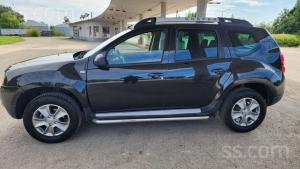 Black Dacia Duster 2015 in Ogre, with an engine capacity of 1.20 L and mileage of 182 thousand km for 5950 €, photo 1 on AUTOMOTO.COM.LV