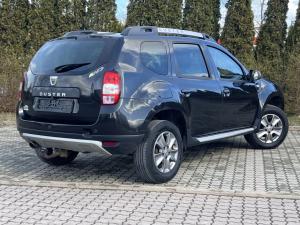 Black Dacia Duster 2016 in Riga, with an engine capacity of 1.20 L and mileage of 130 thousand km for 7990 €, photo 6 on AUTOMOTO.COM.LV