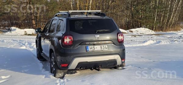 Black Dacia Duster 2021 in Riga, with an engine capacity of 1.50 L and mileage of 156 thousand km for 17545 €, photo 3 on AUTOMOTO.COM.LV