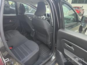 Black Dacia Duster 2023 in Riga, with an engine capacity of 1.00 L and mileage of 85 thousand km for 12850 €, photo 7 on AUTOMOTO.COM.LV