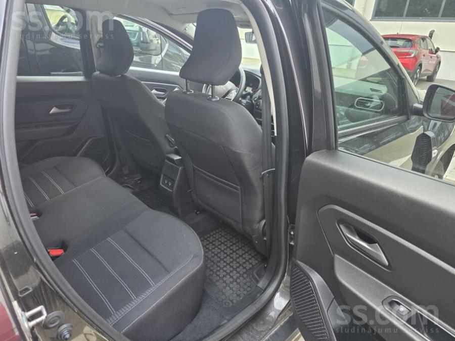 Black Dacia Duster 2023 in Riga, with an engine capacity of 1.00 L and mileage of 85 thousand km for 12850 €, photo 7 on AUTOMOTO.COM.LV