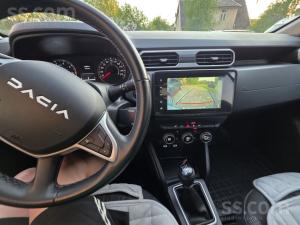 Black Dacia Duster 2023 in Riga, with an engine capacity of 1.00 L and mileage of 85 thousand km for 12850 €, photo 9 on AUTOMOTO.COM.LV