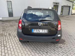 Black Dacia Duster 2011 in Kaunas, with an engine capacity of 1.60 L and mileage of 153 thousand km for 2900 €, photo 8 on AUTOMOTO.COM.LV
