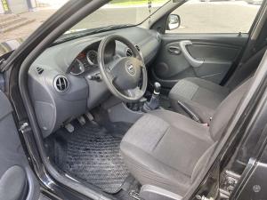 Black Dacia Duster 2011 in Kaunas, with an engine capacity of 1.60 L and mileage of 153 thousand km for 2900 €, photo 10 on AUTOMOTO.COM.LV