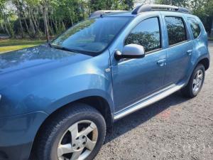 Blue Dacia Duster 2011 in Riga, with an engine capacity of 1.60 L and mileage of 175 thousand km for 7200 €, photo 12 on AUTOMOTO.COM.LV