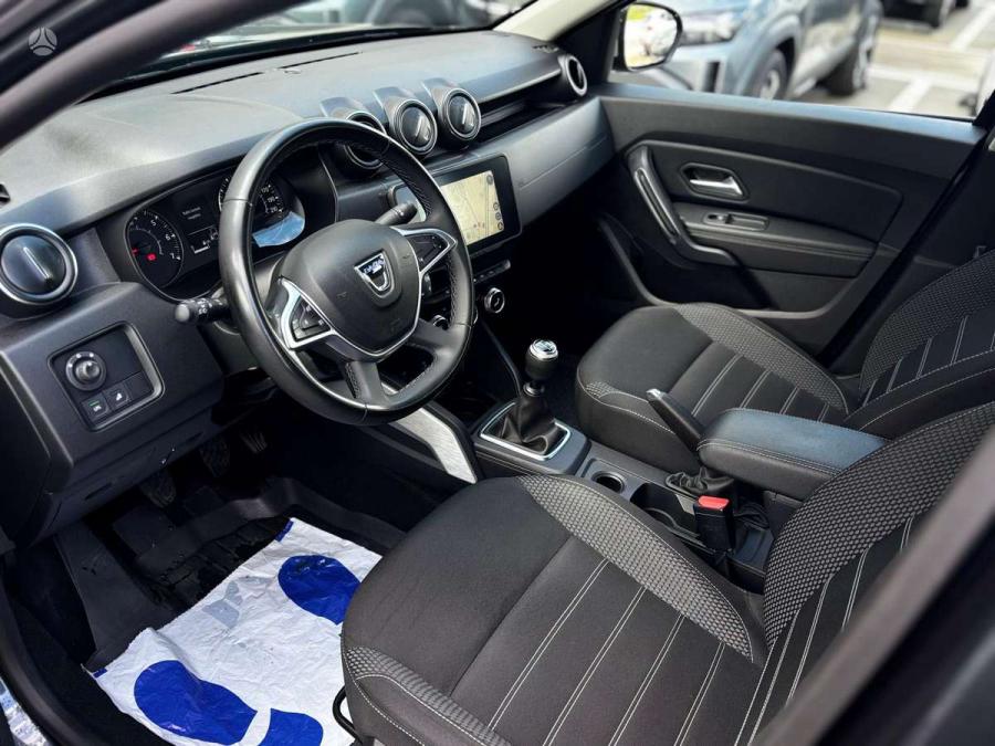 Blue Dacia Duster 2021 in Vilnius, with an engine capacity of 1.00 L and mileage of 65 thousand km for 12000 €, photo 8 on AUTOMOTO.COM.LV