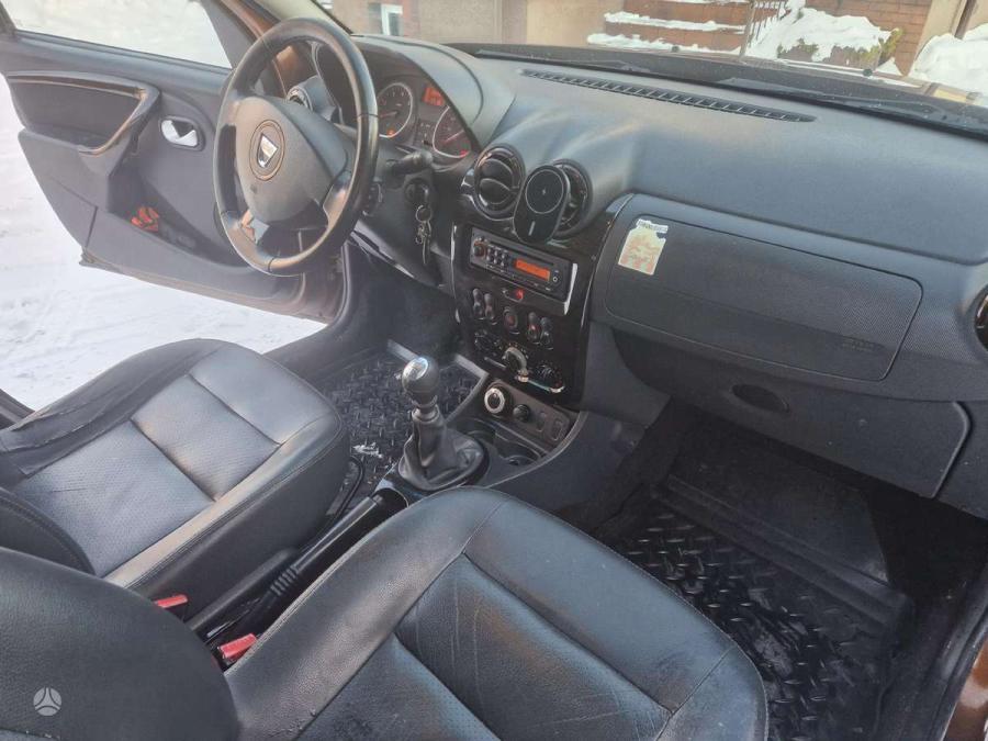 Brūns Dacia Duster 2011 Tauragė, ar dzinēja tilpumu 1.46 L un nobraukumu 166 tūkst. km par 5800 €, foto 8 vietnē AUTOMOTO.COM.LV