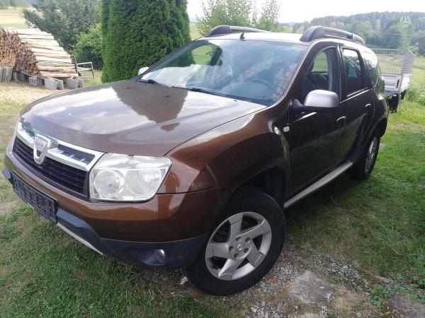 Brown Dacia Duster 2011 in Rokiskis, with an engine capacity of 1.60 L and mileage of 145 thousand km for 3799 €, photo 1 on AUTOMOTO.COM.LV