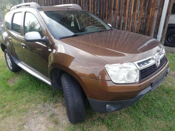 Brown Dacia Duster 2011 in Rokiskis, with an engine capacity of 1.60 L and mileage of 145 thousand km for 3799 €, photo 4 on AUTOMOTO.COM.LV