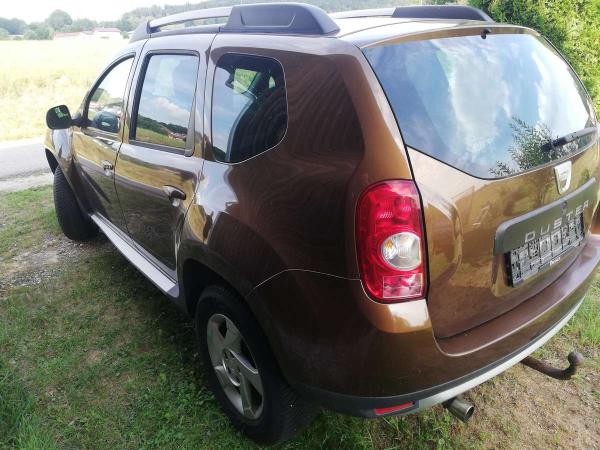 Brown Dacia Duster 2011 in Rokiskis, with an engine capacity of 1.60 L and mileage of 145 thousand km for 3799 €, photo 7 on AUTOMOTO.COM.LV