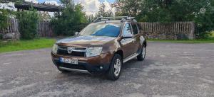 Brown Dacia Duster 2011 in Vilnius, with an engine capacity of 1.46 L and mileage of 264 thousand km for 3599 €, photo  on AUTOMOTO.COM.LV