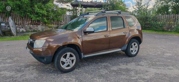 Brown Dacia Duster 2011 in Vilnius, with an engine capacity of 1.46 L and mileage of 264 thousand km for 3599 €, photo 3 on AUTOMOTO.COM.LV