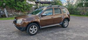 Brown Dacia Duster 2011 in Vilnius, with an engine capacity of 1.46 L and mileage of 264 thousand km for 3599 €, photo 3 on AUTOMOTO.COM.LV