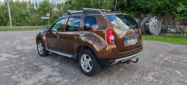 Brown Dacia Duster 2011 in Vilnius, with an engine capacity of 1.46 L and mileage of 264 thousand km for 3599 €, photo 5 on AUTOMOTO.COM.LV