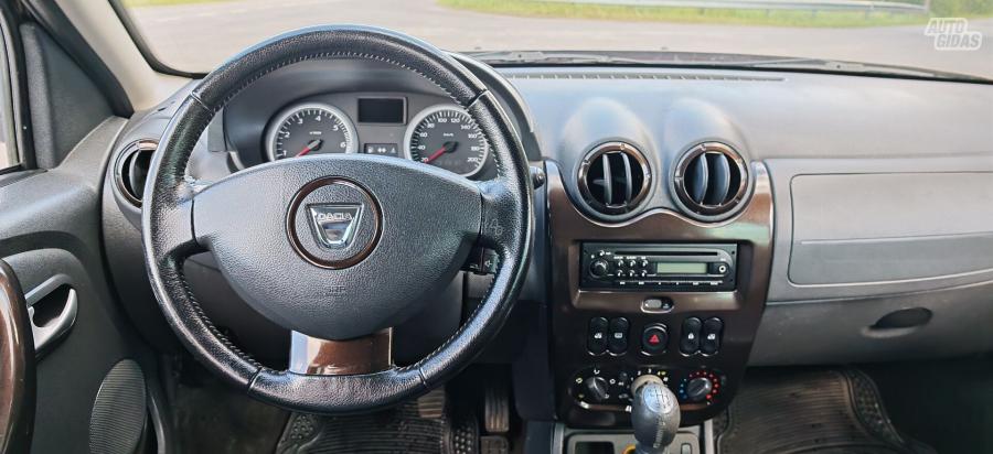 Brown Dacia Duster 2011 in Vilnius, with an engine capacity of 1.50 L and mileage of 264 thousand km for 3599 €, photo 14 on AUTOMOTO.COM.LV