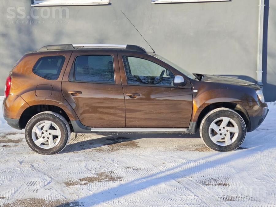 Brown Dacia Duster 2012 in Ogre, with an engine capacity of 1.50 L and mileage of 241 thousand km for 4795 €, photo 3 on AUTOMOTO.COM.LV
