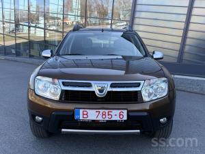 Brown Dacia Duster 2012 in Liepaja, with an engine capacity of 1.60 L and mileage of 175 thousand km for 6600 €, photo 8 on AUTOMOTO.COM.LV