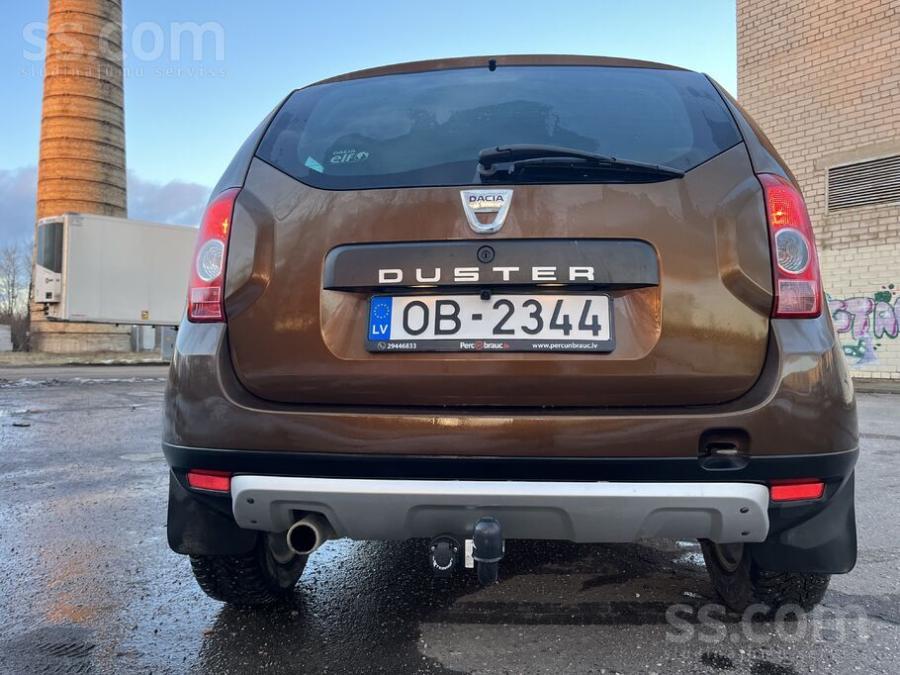 Brown Dacia Duster 2013 in Riga, with an engine capacity of 1.60 L and mileage of 180 thousand km for 5000 €, photo 6 on AUTOMOTO.COM.LV