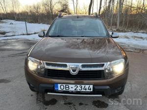 Brown Dacia Duster 2013 in Riga, with an engine capacity of 1.60 L and mileage of 180 thousand km for 5000 €, photo 8 on AUTOMOTO.COM.LV