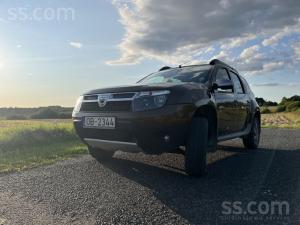 Brown Dacia Duster 2013 in Riga, with an engine capacity of 1.60 L and mileage of 181 thousand km for 4900 €, photo 3 on AUTOMOTO.COM.LV