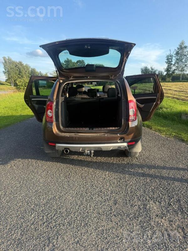Brown Dacia Duster 2013 in Riga, with an engine capacity of 1.60 L and mileage of 181 thousand km for 4900 €, photo 5 on AUTOMOTO.COM.LV