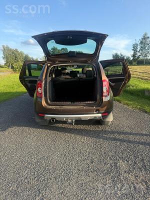 Brown Dacia Duster 2013 in Riga, with an engine capacity of 1.60 L and mileage of 181 thousand km for 4900 €, photo 6 on AUTOMOTO.COM.LV