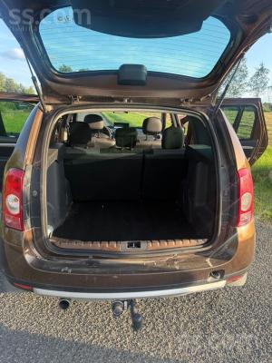 Brown Dacia Duster 2013 in Riga, with an engine capacity of 1.60 L and mileage of 181 thousand km for 4900 €, photo 7 on AUTOMOTO.COM.LV