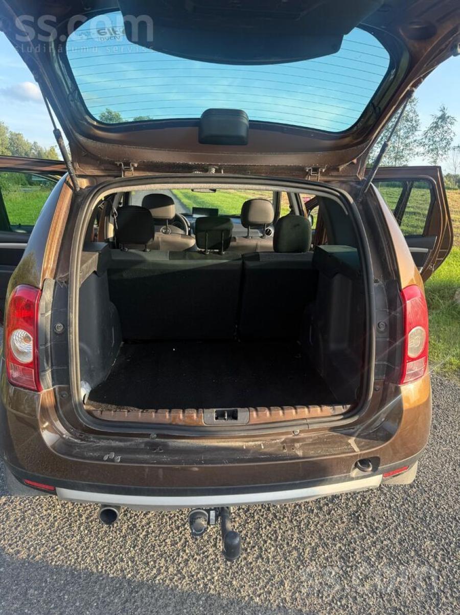 Brown Dacia Duster 2013 in Riga, with an engine capacity of 1.60 L and mileage of 181 thousand km for 4900 €, photo 7 on AUTOMOTO.COM.LV