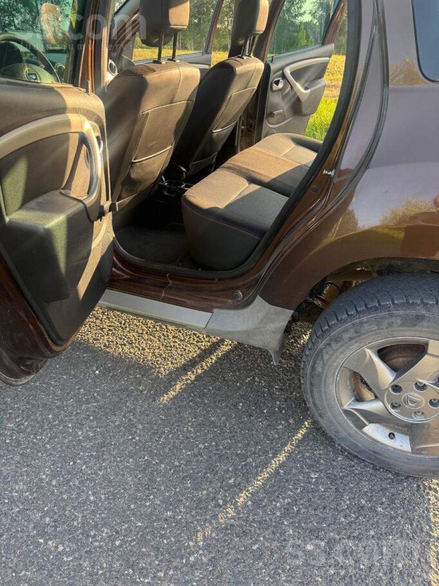 Brown Dacia Duster 2013 in Riga, with an engine capacity of 1.60 L and mileage of 181 thousand km for 4900 €, photo 9 on AUTOMOTO.COM.LV