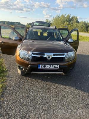 Brown Dacia Duster 2013 in Riga, with an engine capacity of 1.60 L and mileage of 181 thousand km for 4900 €, photo 11 on AUTOMOTO.COM.LV