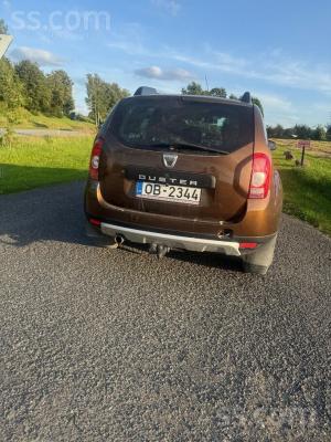Brown Dacia Duster 2013 in Riga, with an engine capacity of 1.60 L and mileage of 181 thousand km for 4900 €, photo 12 on AUTOMOTO.COM.LV